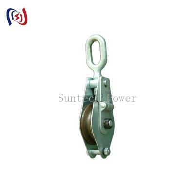 China 10KN-150KN Wire Rope Pulley Block Casting Construction Hoisting Tackle for sale