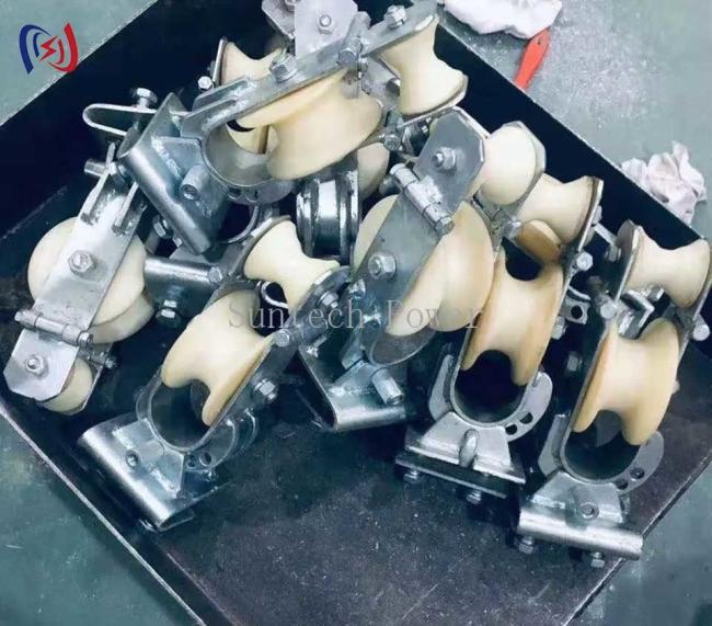 Conductor stringing blocks for transmission line construction