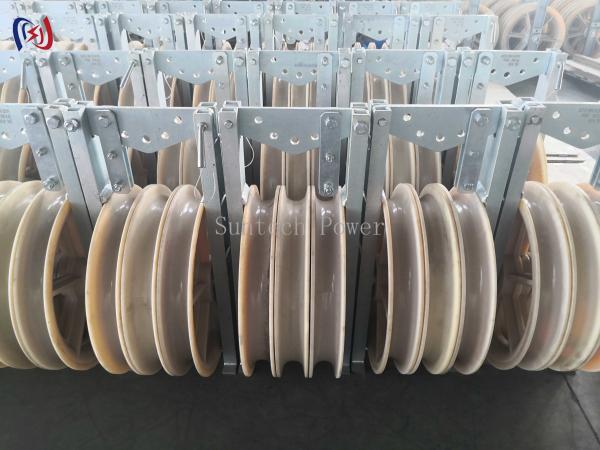 Quality 60KN Aluminum Nylon Sheaves Pulleys Three Sheave Transmission Stringing Blocks for sale