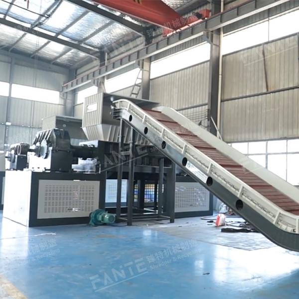 Quality Continuous Operation Dual Shaft Industrial Shredder for Plastic Film Pp Pe Bottles Rubber Tires With Safety Grating for sale