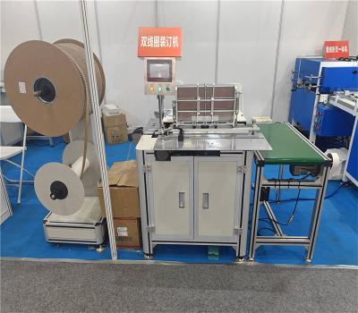 China DWC-520 Livros de texto semiautomáticos Calendários Mapas da cidade Enlaçamento Equipamento de máquinas de fabricação à venda