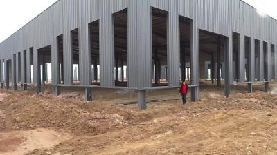 Cina Wide Width Pre Built Light I Beam Warehouse Construction with Aluminum Alloy Window (Construzione di un magazzino con vetro di alluminio) in vendita
