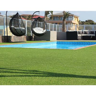 Cina Il tempo rinforza l'erba tappeto naturale verde mettente artificiale del giardino del tappeto erboso 60MM in vendita