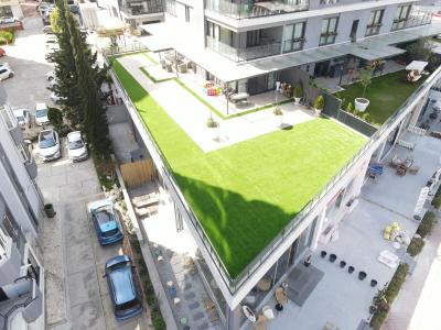 Cina L'erba artificiale del paesaggio tappezza 45mm per la decorazione domestica del giardino in vendita