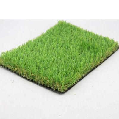 Cina Il giardino che abbellisce l'erba naturale tappezza la buona rigidezza artificiale in vendita