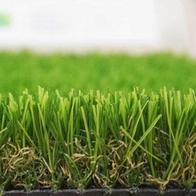 中国 Wの耐久性の庭の人工的な草はヤーン60mmの山の高さを形づけた 販売のため