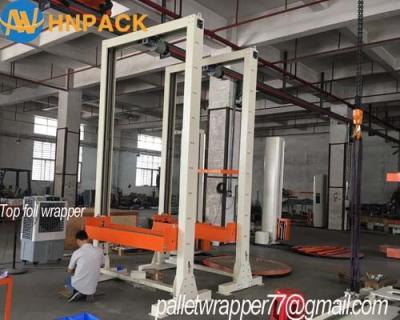 China Automatic inline Pallet Top Foil CoverTop Foil ApplicatorTop Sheet Stretch Film Dispenser for sale