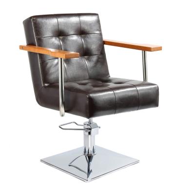 China Salon chair suppliers footrest hairdressing haircut chair;black styling chair with wood armrest;hot sale barber chair for sale