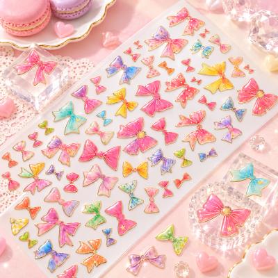 China Custom Gold Foil Epoxy Stickers with Bow Designs for Decoration for sale