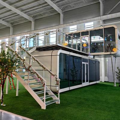 China Customizable And Eco-friendly Apple Cabin House With Galvanized Steel Frame And Metal Carved Panel for sale