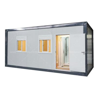 China Kostenefficiënt Arbeidsbesparend Flat Pack Container House Prefab Buildings Mini Warehouse for sale