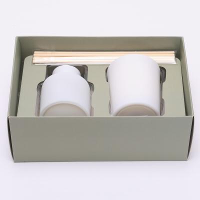 Cina 50ml Matte White Bottle Reed Diffuser ha messo con il cappuccio di legno ha sentito le candele in vendita