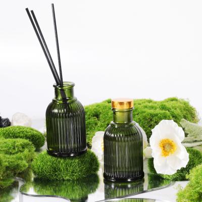 Cina Diffusore a lamella per bottiglia di vetro profumata da giardino Etichetta privata 100 ml con coperchio in metallo dorato in vendita