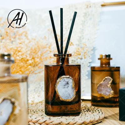中国 繊維の藤の正方形の金ふたのガラス ビンの精油の香りのReedの拡散器180ML 販売のため