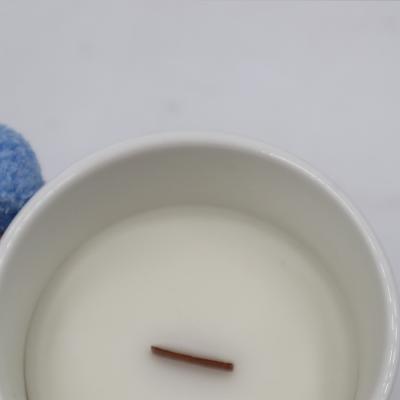 Cina La sensazione dell'aroma ha sentito la candela ceramica bianca con lo stoppino di legno in vendita