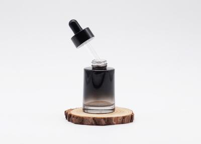 China Luxury Black Essential Oil Bottle Dropper Serum Glass Cylinder Cosmetic for sale