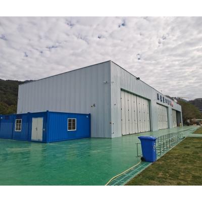China Metallgebäude Bauprojekte Industriefertigwaren Metalldach Stahlkonstruktion Flugzeughangar zu verkaufen