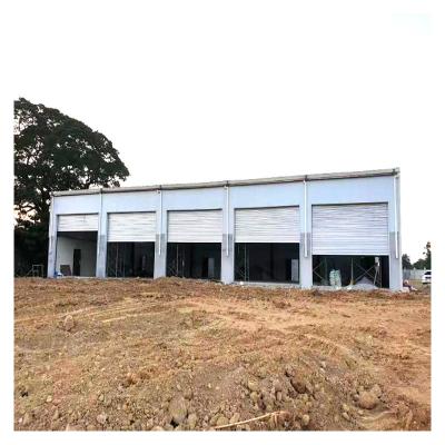 China Construcción de estructuras de acero OEM de una sola capa Mini kits de almacenes prefabricados en venta