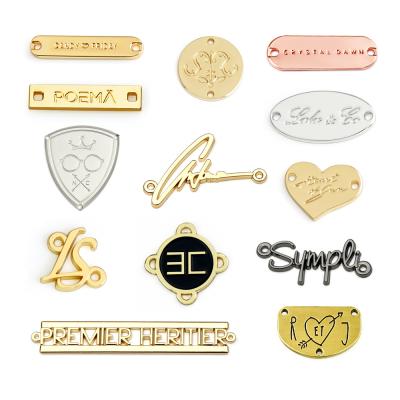 Cina Customized Round Metal Tag for Garment Engraved Logo Light Gold Name Fixation Rivet in vendita