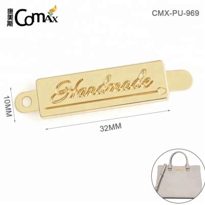 China Superior Metal Label For Handbags Custom Rectangle Gold Name Plate Hardware Accessories à venda