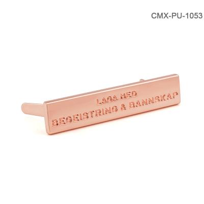 China Customized Engraved Logo In Metal Color Gold Rose Bag Label Ecofriendly Hardware à venda