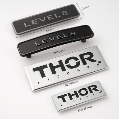 China Fashion Die Casting Metal Tag For Furniture Embossed Logo Customized Metal Label à venda