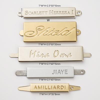Cina Custom Engraved Label Plate Polished Plated Metal Logo for Bag Accessories in vendita