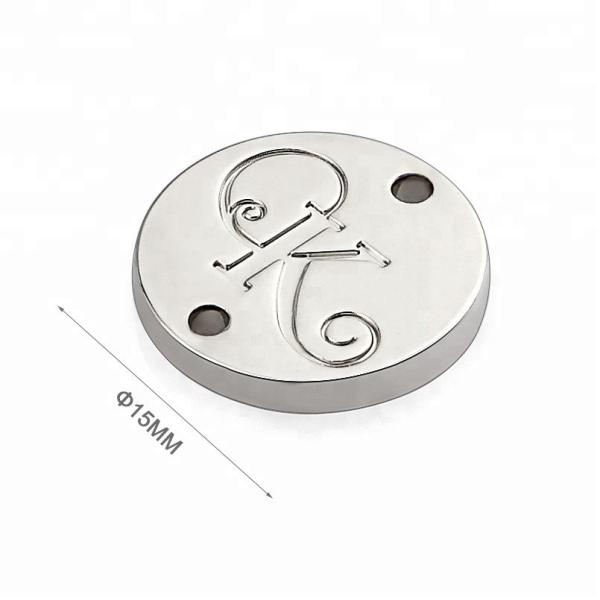 Quality Custom Nickel Sewing Metal Logo Tag for Clothing 15mm Round Shape With 2 Holes Design for sale