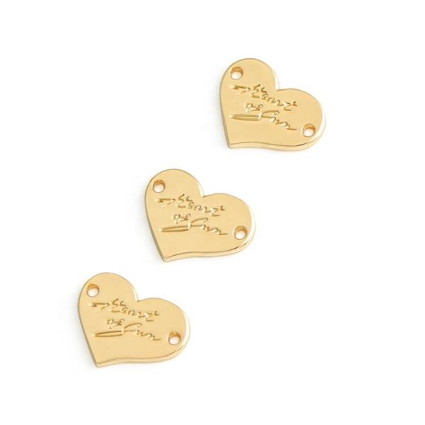 Quality Glossy Finished Heart Shape Sewing Metal Cloth Label for Swimwear Garment Accessories for sale
