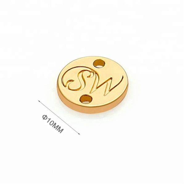 Quality Custom Metal Clothing Label Tags for Swimwear Metal Round Sewing Logo Golden Finish for sale