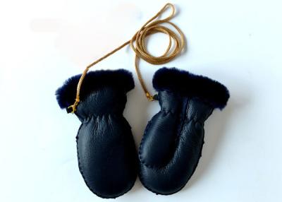 Cina Guanti genuini accoglienti caldi della pelle di pecora ragazze/dei neonati con il nastro per l'inverno in vendita