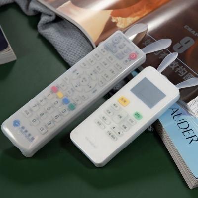 China Cubierta/manga/estuche protector de silicona con orejas de conejo verde oscuro que brillan en la oscuridad para TV y control remoto de aire acondicionado en venta