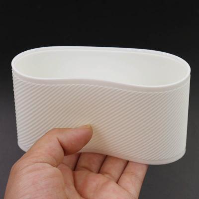 Cina Custodia per forniture in gomma siliconica antiscivolo OEM portatile per bottiglia d'acqua in vendita