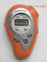 China Mango Shape FM Radio with LCD Time Display 25mm AAA Battery Powered Clock for sale