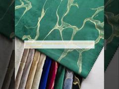 Tessuto di velluto con stampa floreale bronzo, poliestere con tecniche a maglia, colore personalizzato
