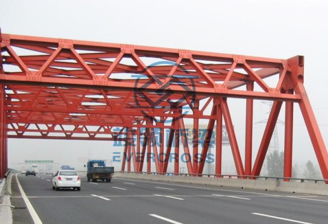 Completed steel truss bridge installation showcasing full structure