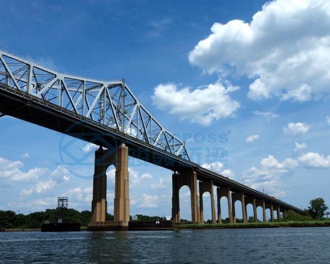 Completed steel truss bridge in operational environment