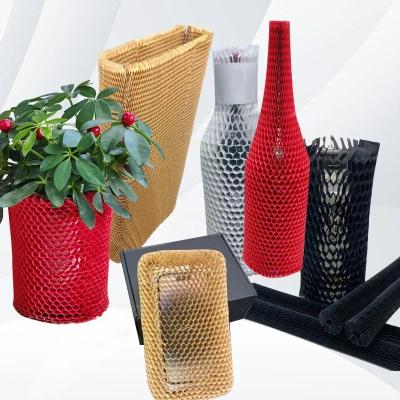 China Transport Fragile Products Grid Kraft Paper Biodegradable Honeycomb Paper Sleeve for sale
