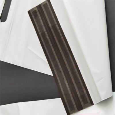 China Customized Compostable Mailing Bag 100% Biodegradable Mailers Waterproof With Flexiloop Handle for sale