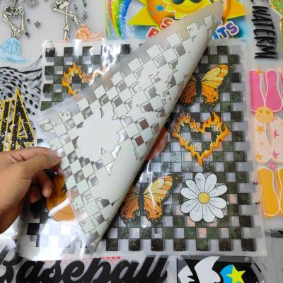 Китай Детройтная печать с трансфером Dtf для футболок с тепловым трансфером, включающая прочную печать, которая выдерживает износ после многократной стирки. продается