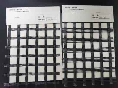 China SBR Coating Polyester Geogrid 100-30Kn/M PET Uniaxial Reinforced Soil Retaining Wall Expressway for sale