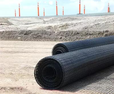 China Road Reinforcement 80kn Fiberglass Geogrid Mesh Driveway Geogrid For Soil Stabilization Geogrid for sale