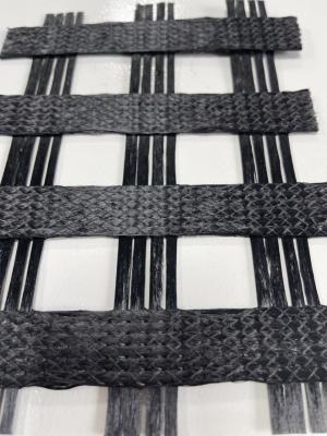 China 300-50 KN/m Reinforce Polyester Uniaxial Geogrid Dam And Slope River Bank Embankment Stabilization for sale