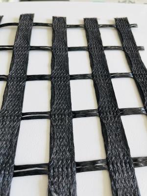 China Biaxial PET Grid 300-300 Woven Coated Polyester Geogrid For Railway Foundation  Reinforcement for sale