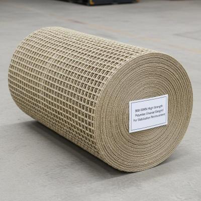 China 900-50KN High Strength Polyester Uniaxial Geogrid For Stabilication Reinforcement for sale