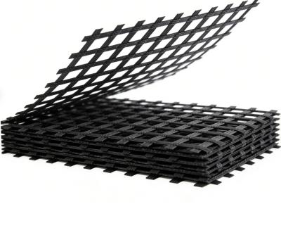 China Asphalt Reinforcement  FG150-150 KN/M  Bitumen Coated Grid Mesh Prevent Asphalt Cracking for sale