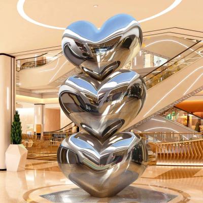 China Hotel Decoration Mirror Finish Stacked Heart Stainless Steel Sculpture for sale