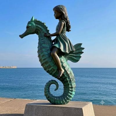 China Life-Size Bronze Girl Riding Seahorse Statue for sale
