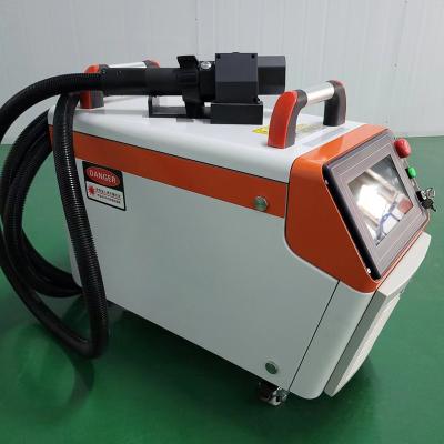 Cina Pulitore laser a fibra portatile per la rimozione della vernice ad olio della ruggine della macchina per la pulizia del laser 300W in vendita