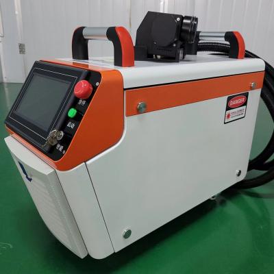 Cina Pulitore laser a fibra portatile per la rimozione della vernice ad olio della ruggine della macchina per la pulizia del laser 300W in vendita